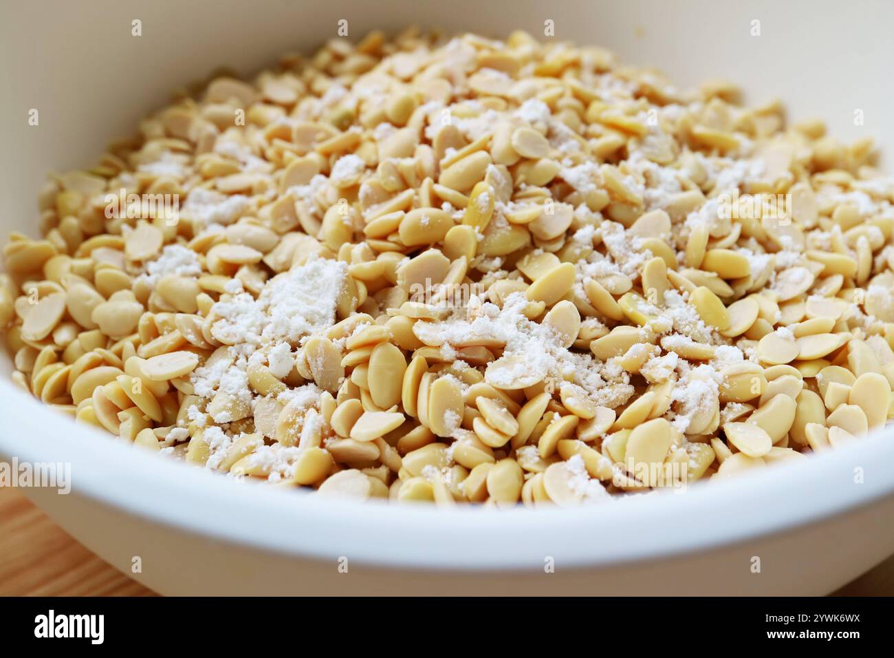 Powdered Tempeh Starter Being Mixed with Boiled Soybeans for Making ...