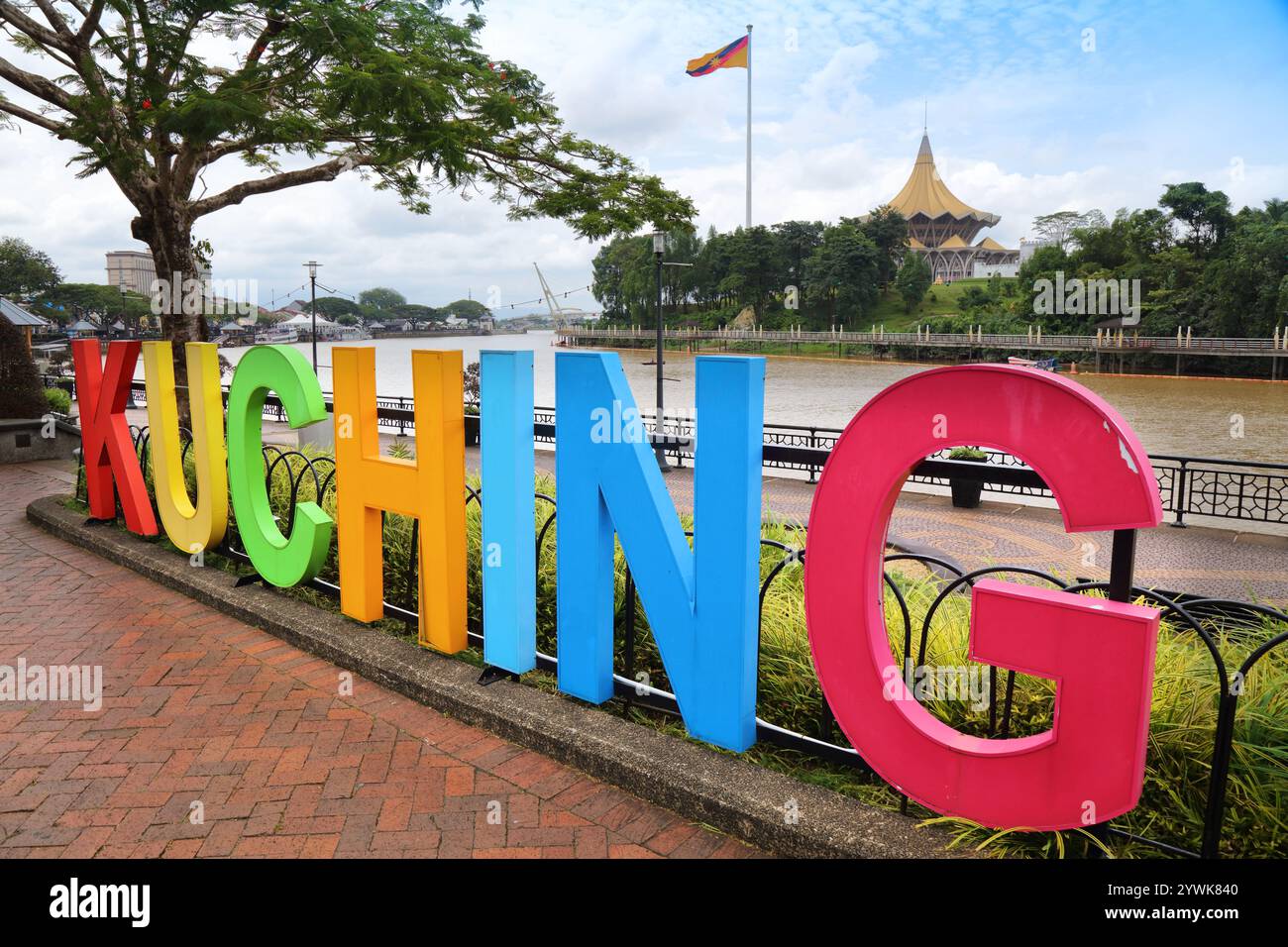 Kuching sign with Sarawak Parliament building in Petra Jaya district of ...