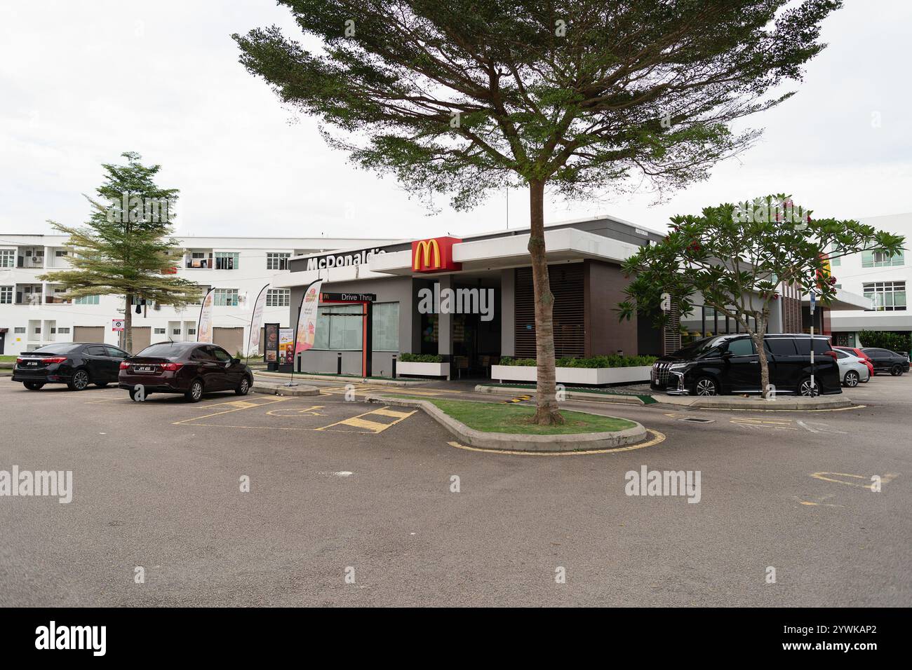 SENAI, MALAYSIA - NOVEMBER 27, 2023: street level view of McDonald's ...