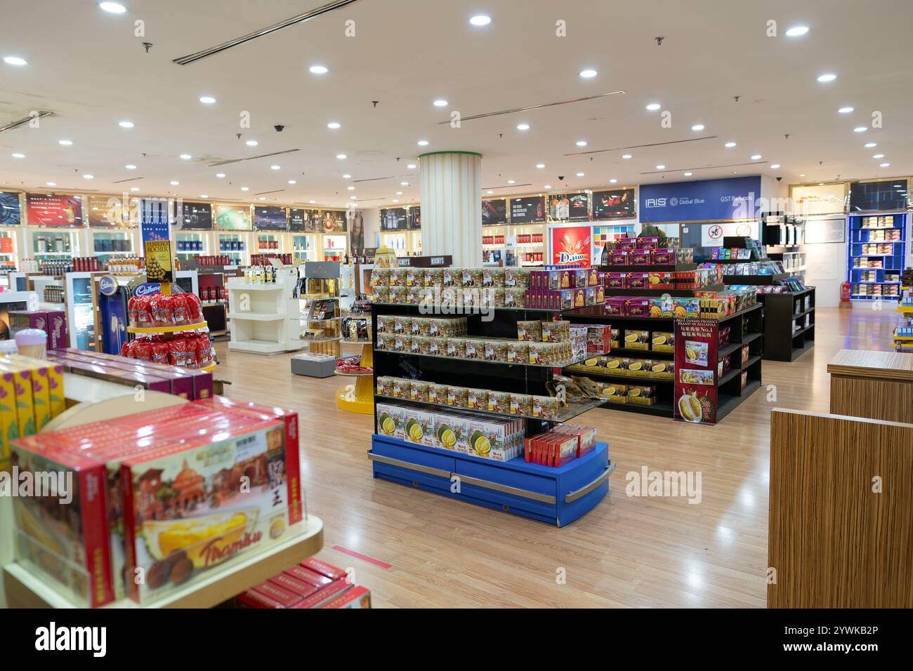 SENAI, MALAYSIA - NOVEMBER 27, 2023: goods on display in the duty-free ...