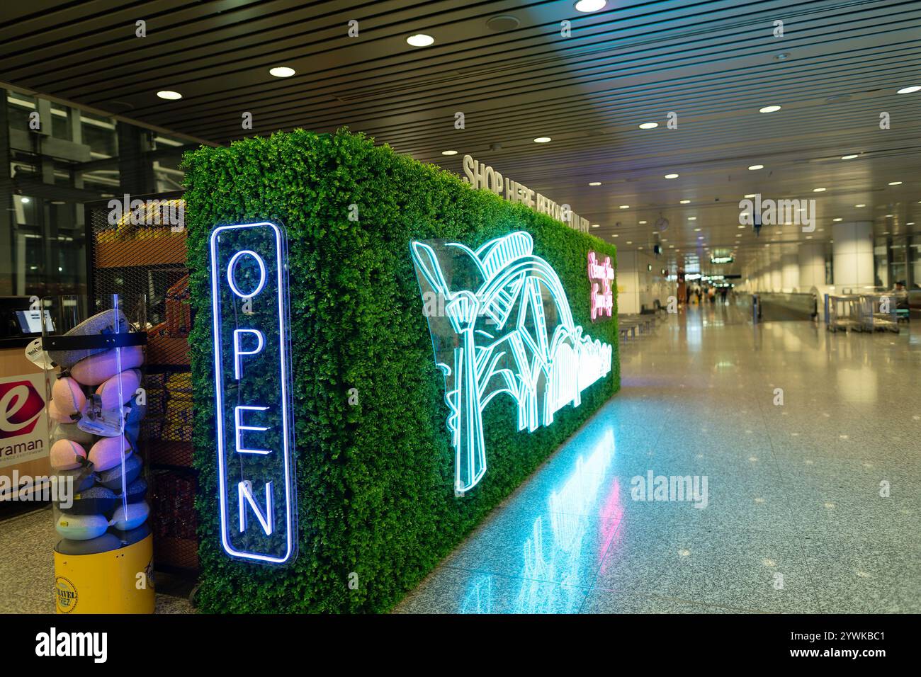 KUALA LUMPUR, MALAYSIA - NOVEMBER 27, 2023: neon "OPEN" sign at KLIA ...