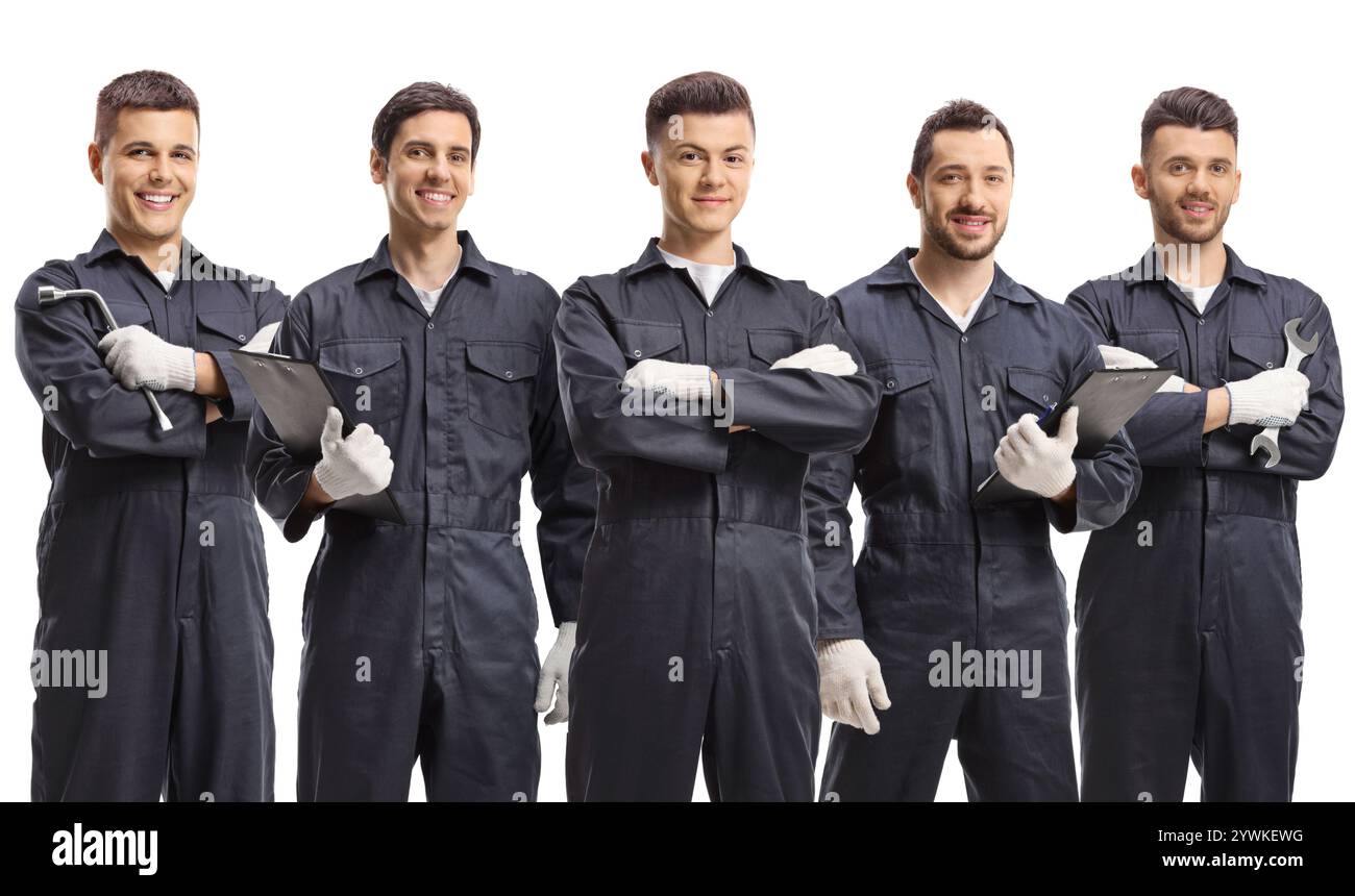 Team of auto mechanic workers in uniforms isolated on white background ...
