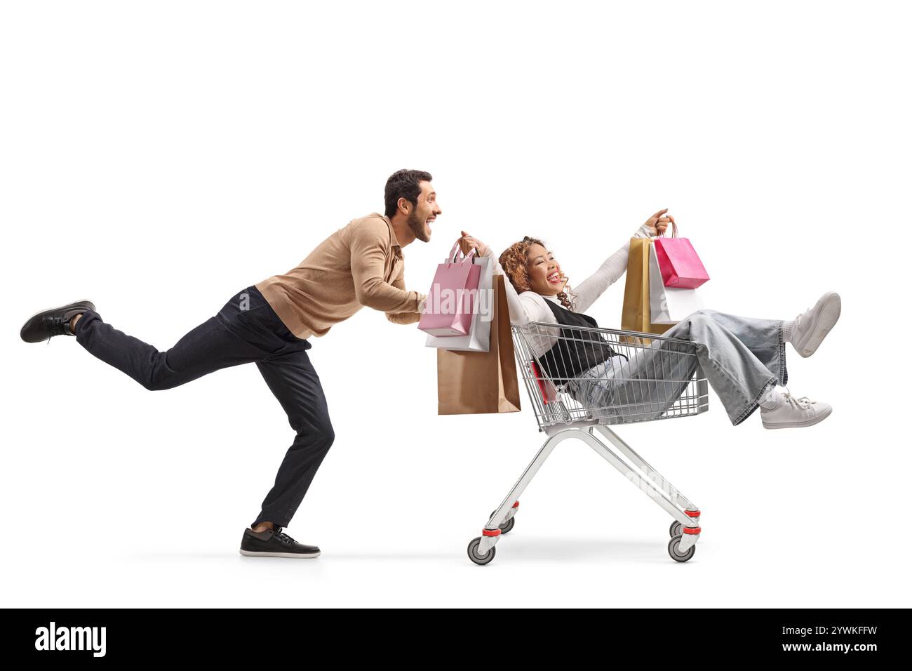 Man and woman with shopping bags having fun and riding in a shopping ...
