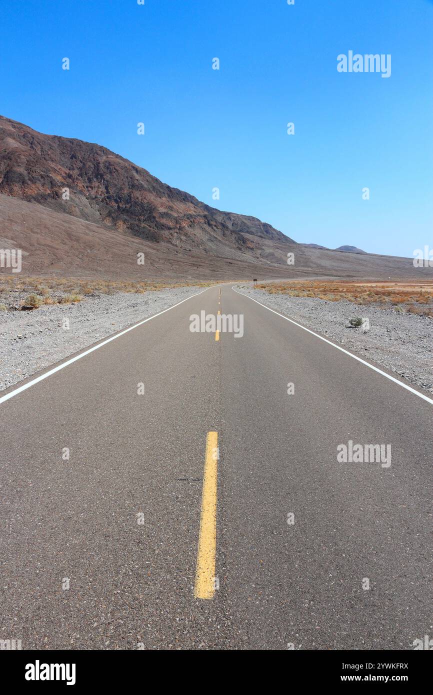 Death Valley road - empty highway in Mojave Desert, California ...
