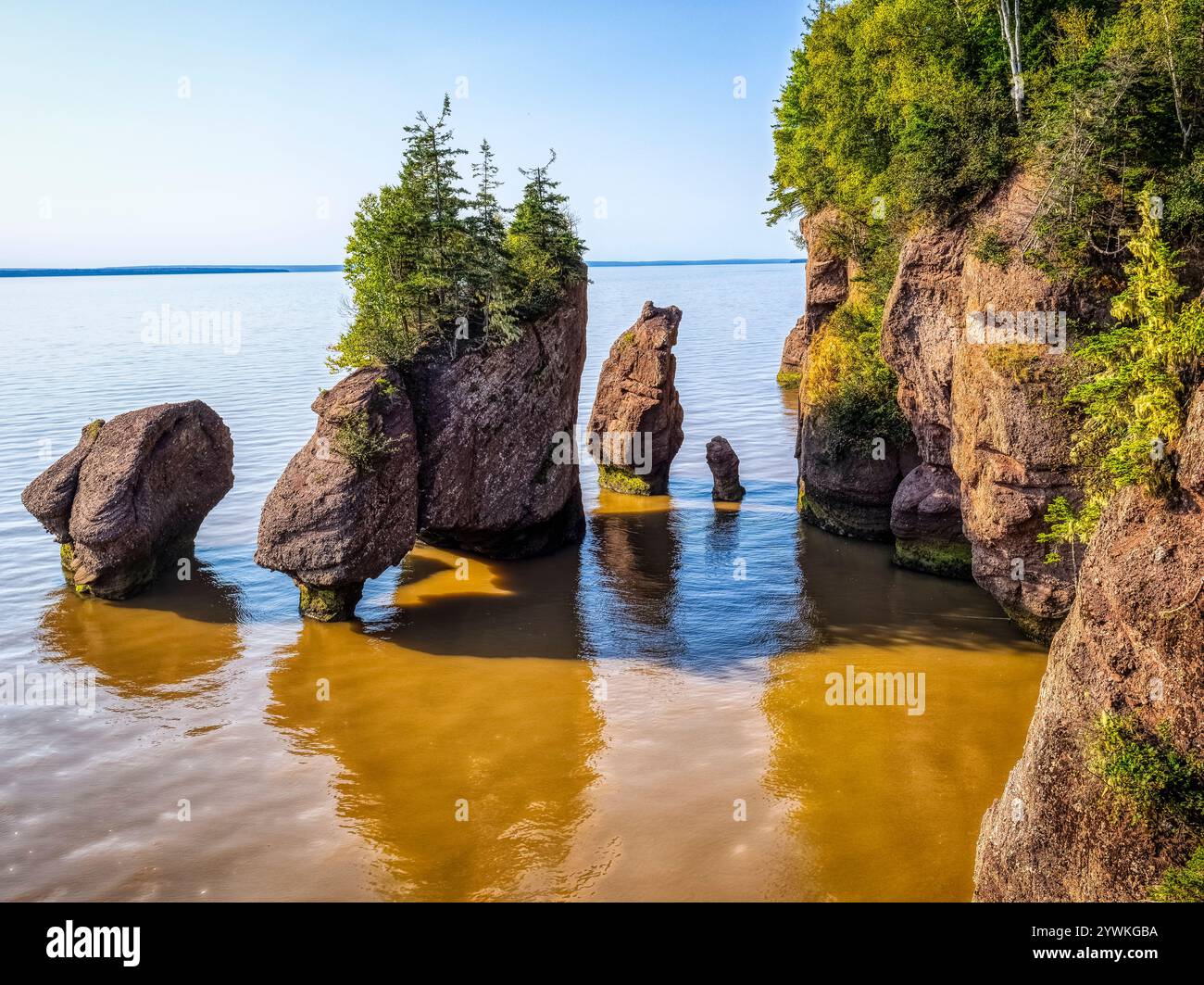 High tide around sea stacks in the Bay of Fundy at Staircase Cove in ...