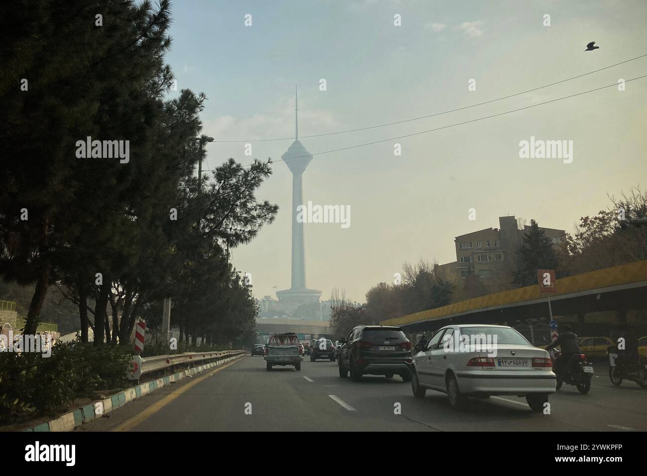 Tehran, Iran. 11th Dec, 2024. Smog partially obscures the Milad ...