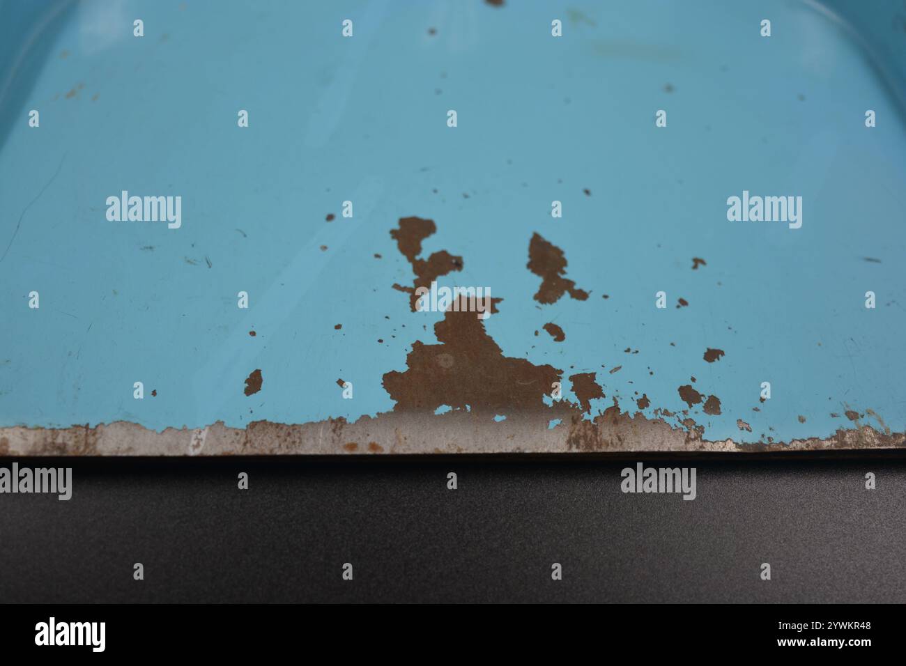 Old worn-out material. A thick layer of painted metal from which the ...