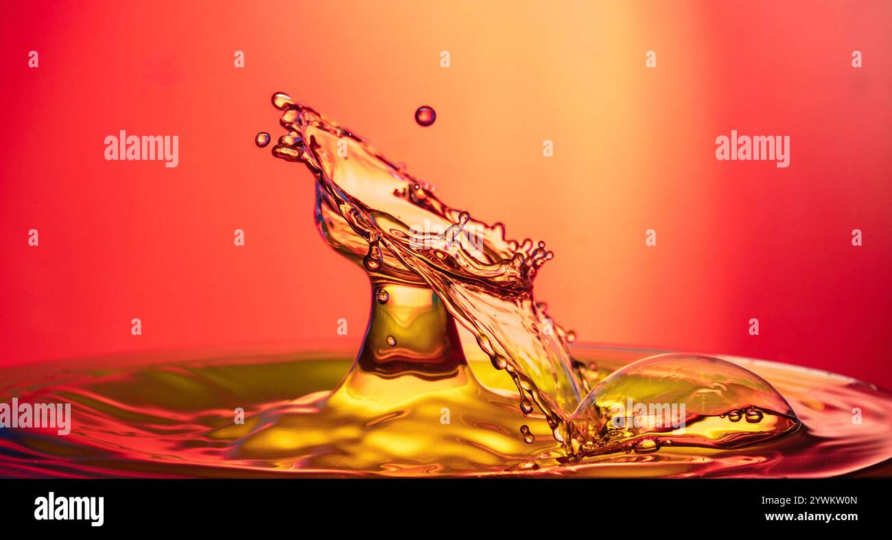 Arresting ethereal colour infused imaginative water collision macro ...