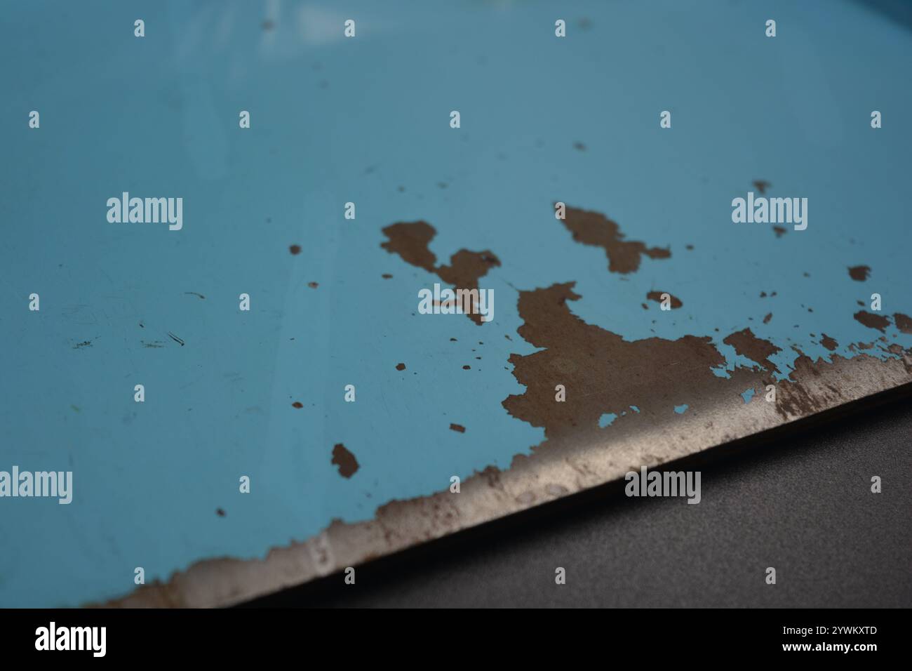 Old worn-out material. A thick layer of painted metal from which the ...