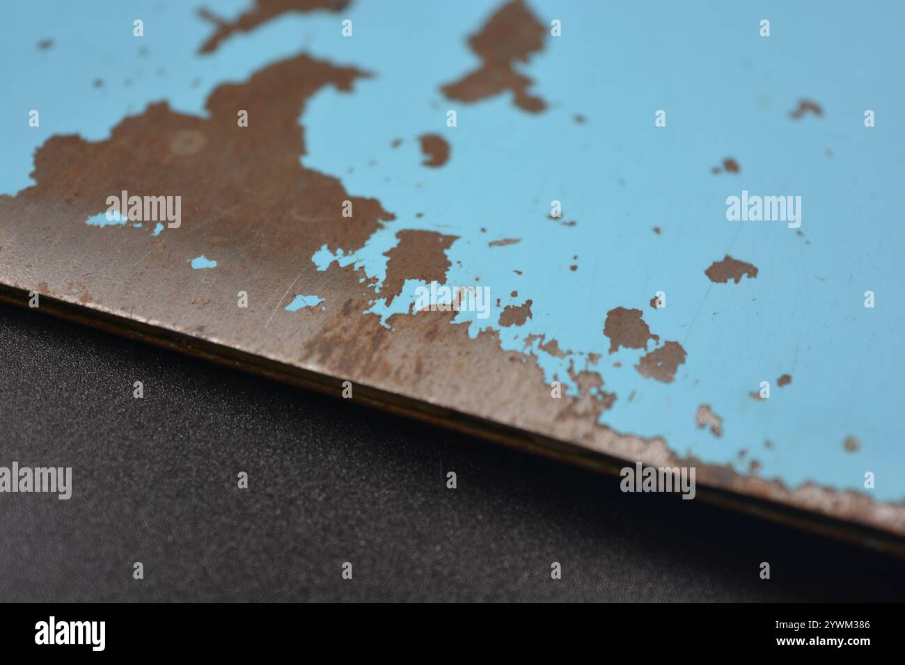 Old worn-out material. A thick layer of painted metal from which the ...