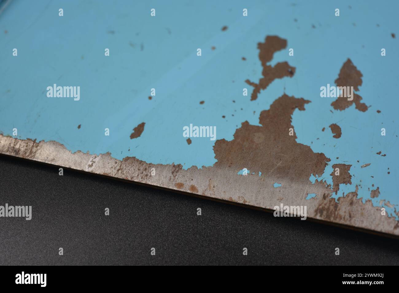 Old worn-out material. A thick layer of painted metal from which the ...