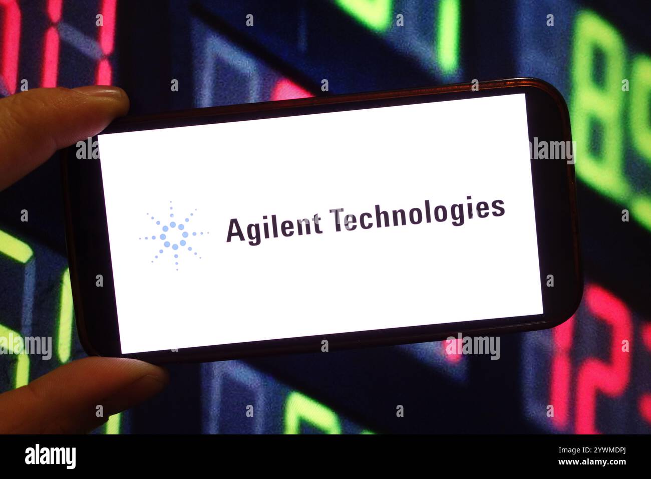 In this photo illustration, the Agilent Technologies company logo is ...