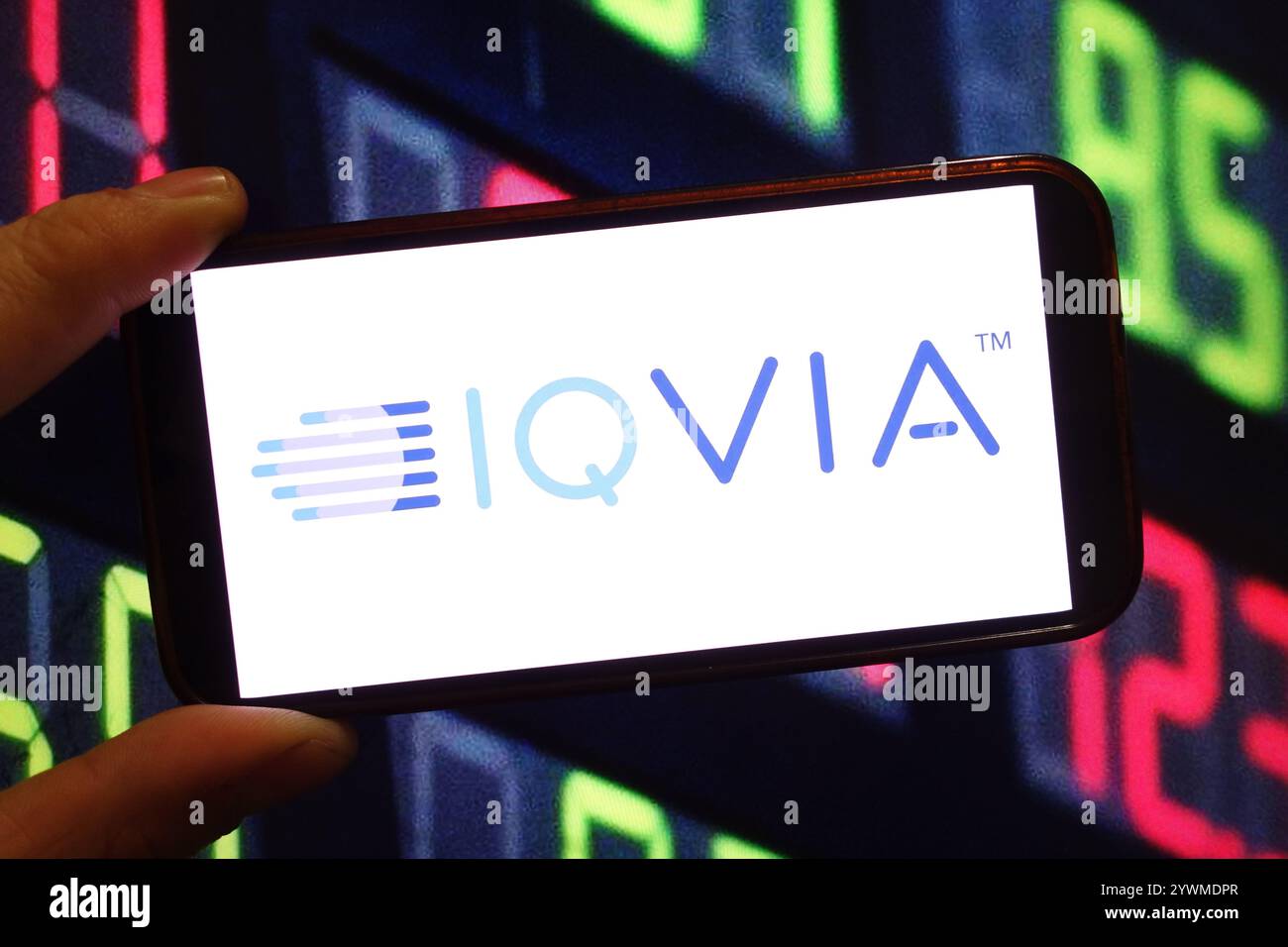In this photo illustration, the IQVIA company logo is seen displayed on ...