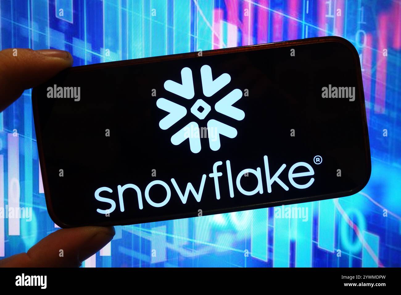 In this photo illustration, the Snowflake company logo is seen ...