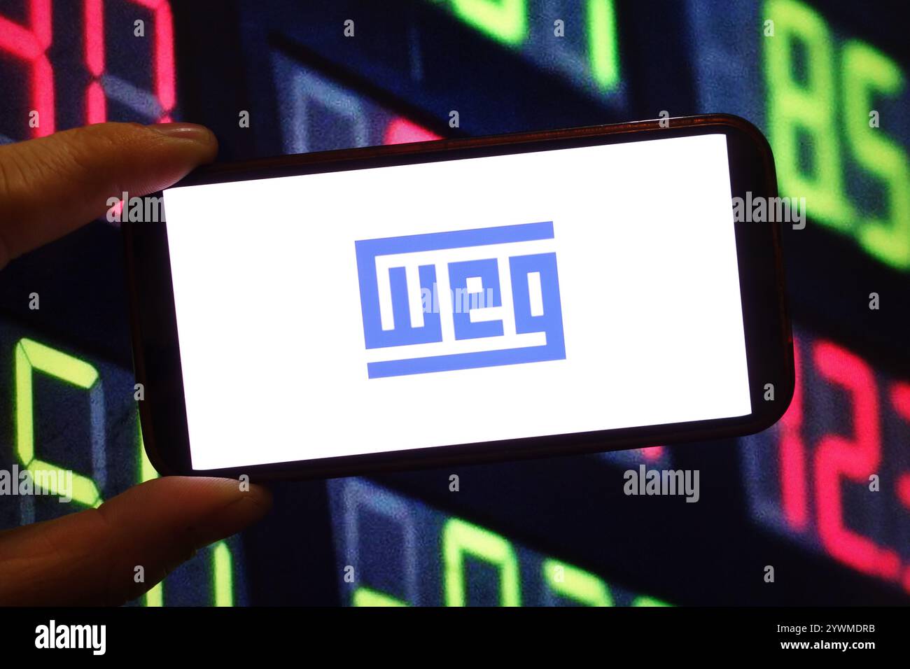 In this photo illustration, the WEG ON company logo is seen displayed ...