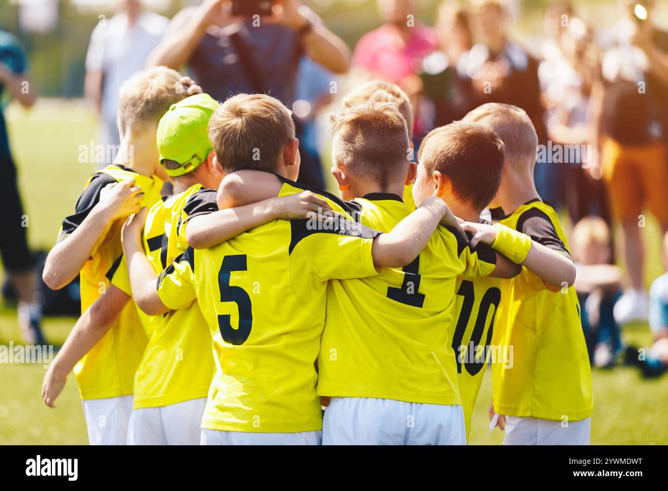 Kids in sport team in celebration time. Soccer team members having fun. Children soccer team ...
