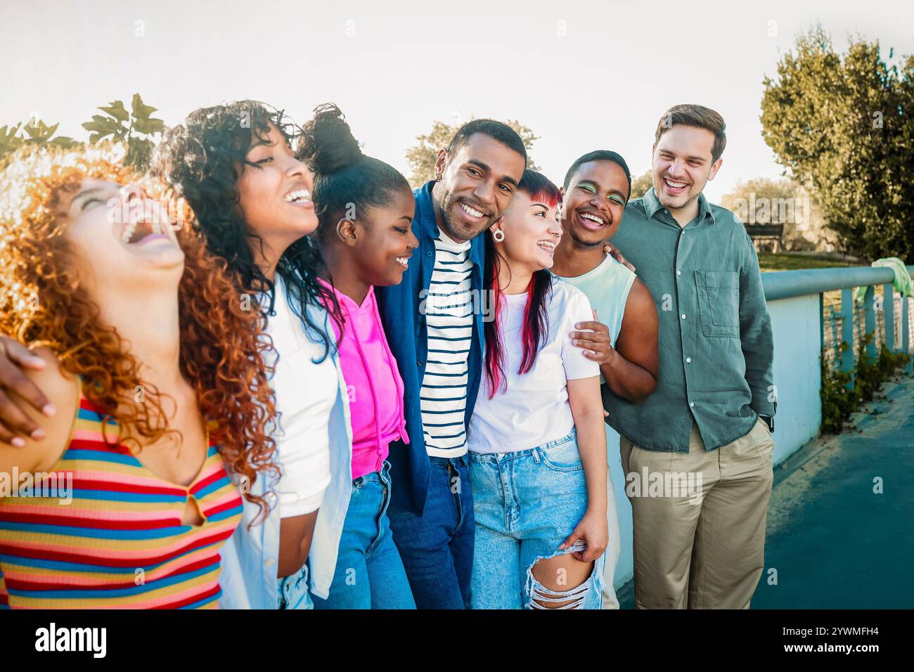 Group of people having fun celebrating together. Teenager guys enjoy ...