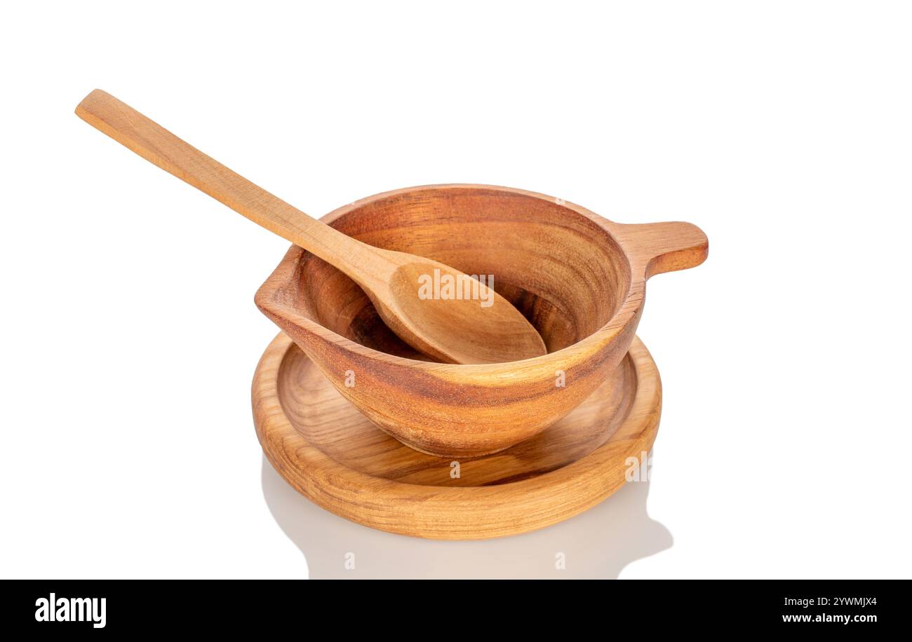 One wooden cup and saucer, close-up, isolated on a white background ...