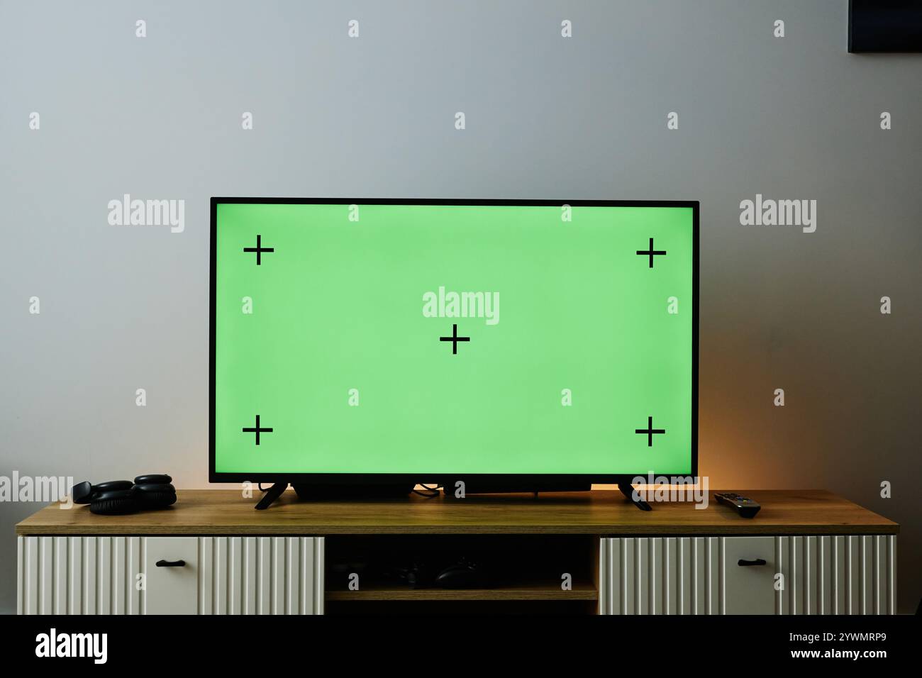 Front view background image of big flat screen TV with green chroma key ...