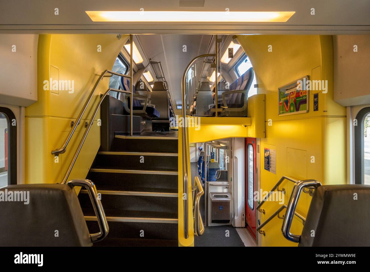 Interior of a double deck passenger train Stock Photo - Alamy