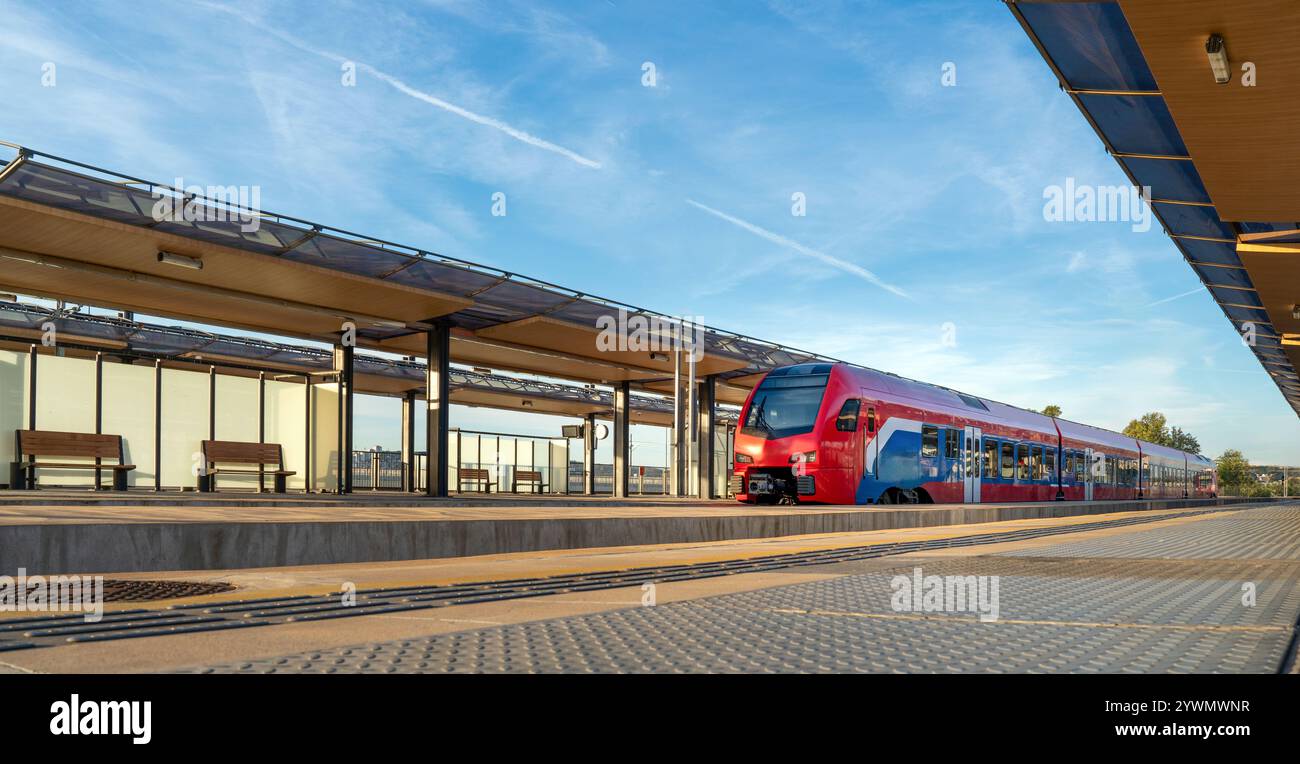 Zero emission train at railroad platform in the station Stock Photo - Alamy