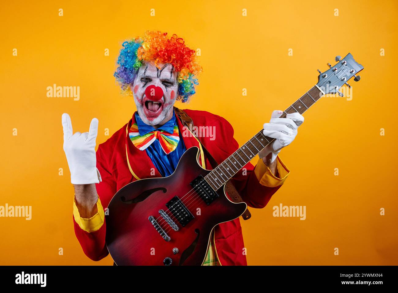 The clown with guitar hi-res stock photography and images - Alamy