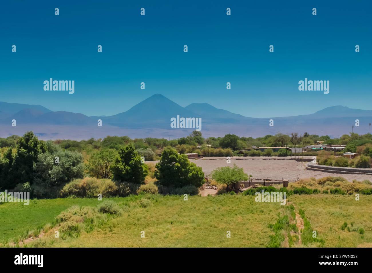 Salt flats and volcano mountains on altiplano high altitude plains in ...