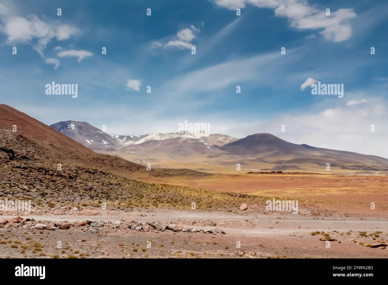Salt flats and volcano mountains on altiplano high altitude plains in ...