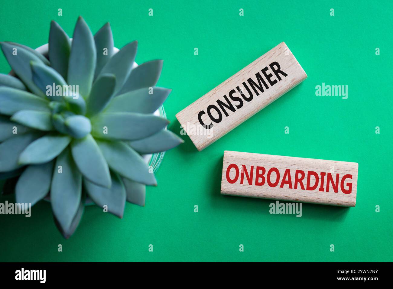 Consumer Onboarding symbol. Wooden blocks with words Consumer ...