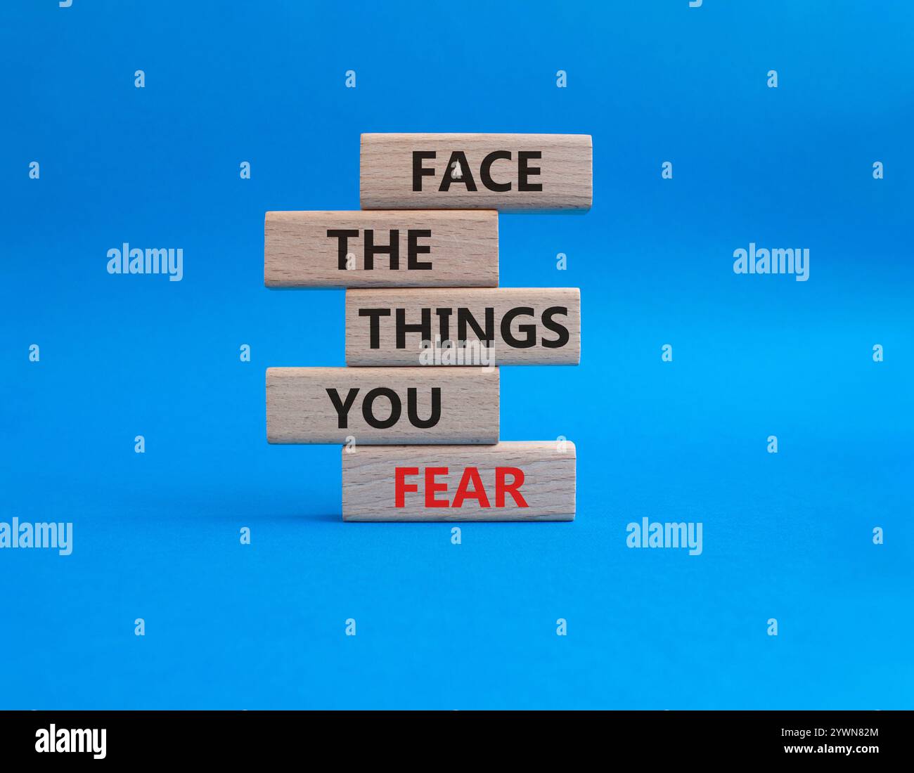 Face the things you fear symbol. Wooden blocks with words Face the ...