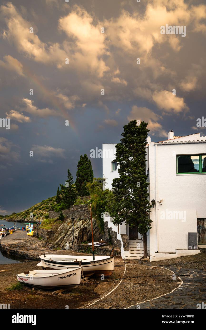 Salvador Dali's house in the bay of Portlligat under a dramatic sky and ...