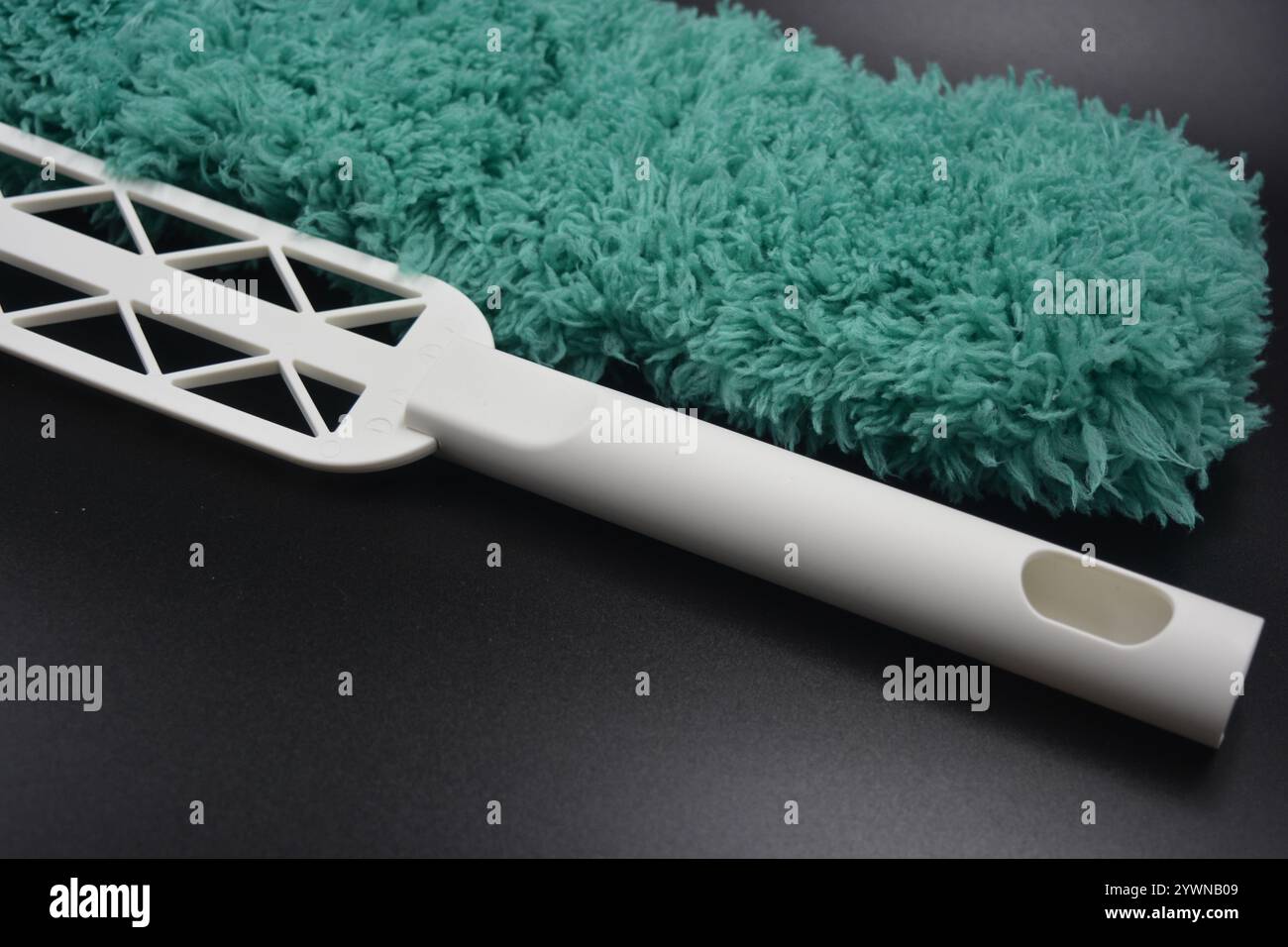 Beautiful green soft fluffy, nylon, synthetic fabric with white plastic ...