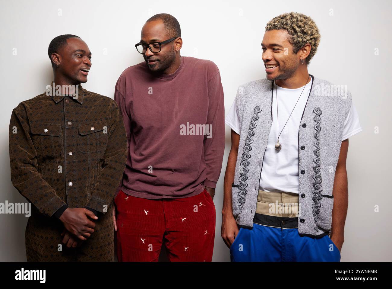 Ethan Herisse, left, RaMell Ross, and Brandon Wilson pose for a ...