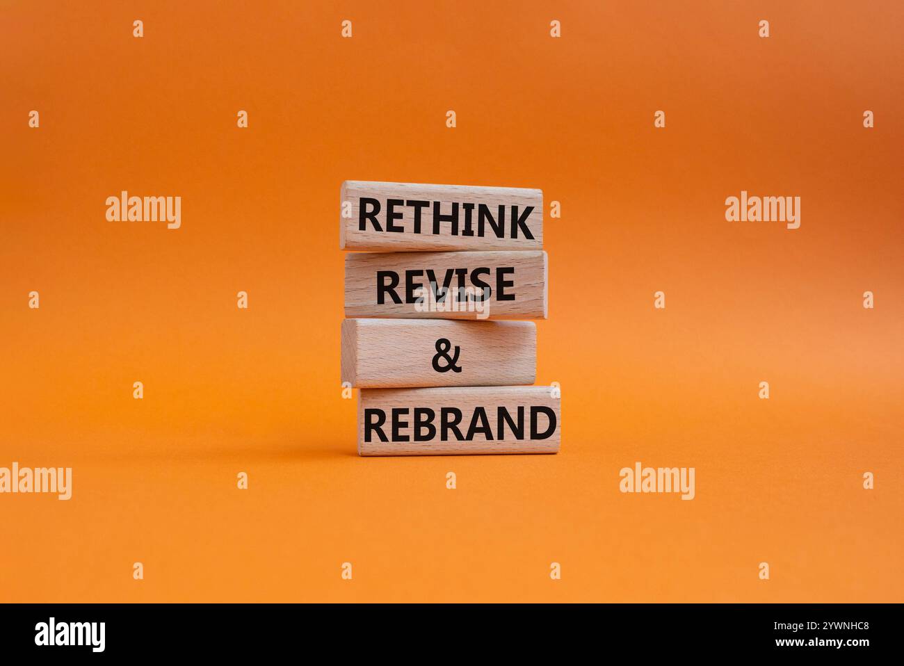 Rethink Revise and Rebrand symbol. Wooden blocks with words Rethink ...