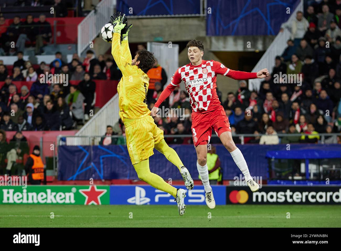 Alisson of Liverpool FC stops a ball during the UEFA Champions League ...