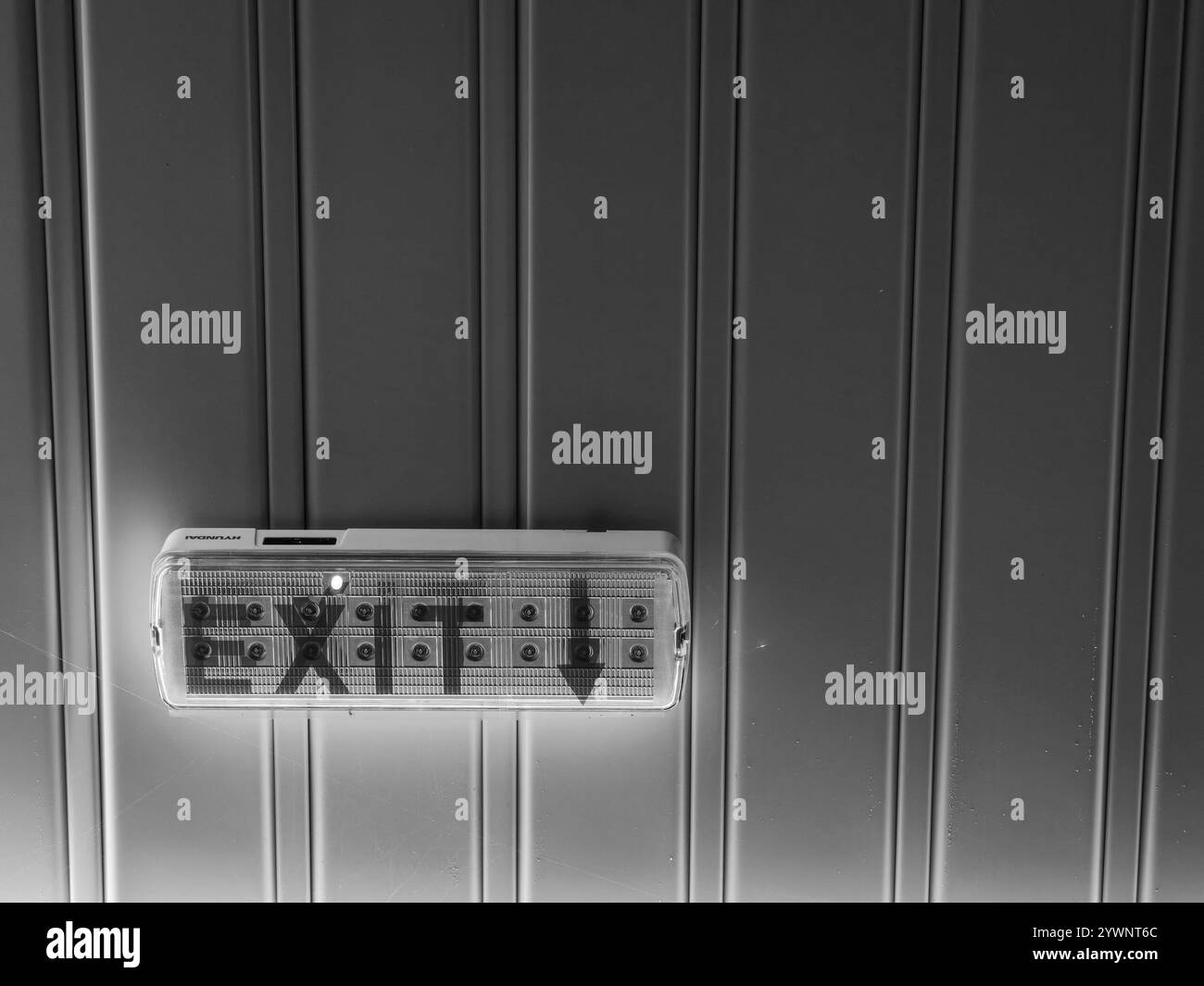 Illuminated Exit Sign: A Path to Escape Stock Photo - Alamy