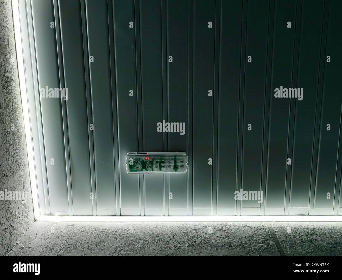 Illuminated Exit Sign: A Path to Escape Stock Photo - Alamy
