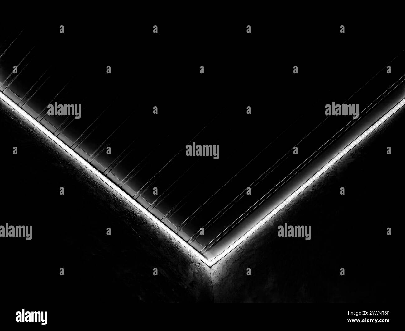 Neon Light Fixture: Angular Illumination Against Black Stock Photo - Alamy