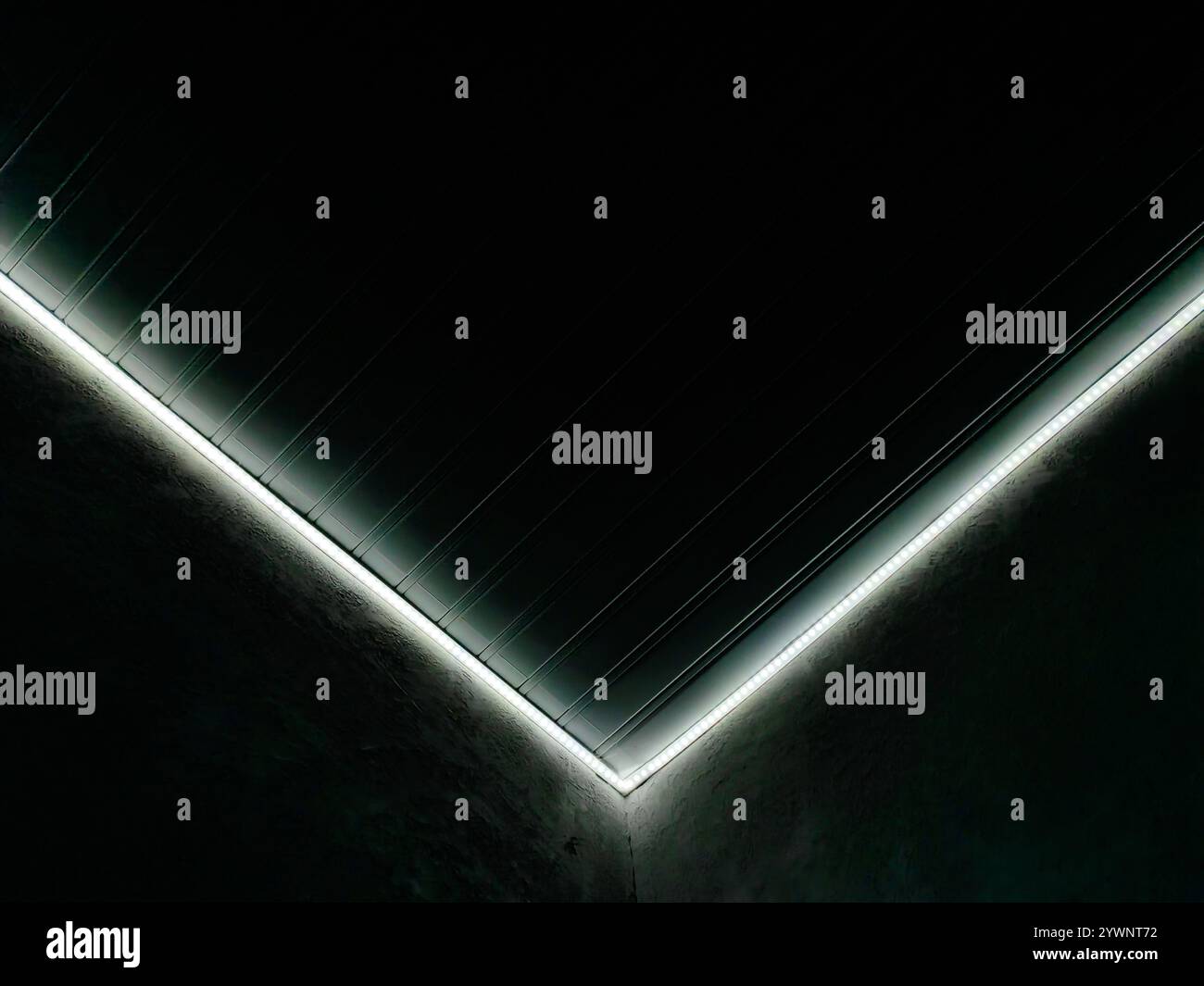 Neon Light Fixture: Angular Illumination Against Black Stock Photo - Alamy