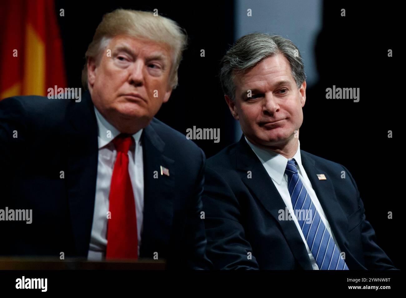 FILE - President Donald Trump sits with FBI Director Christopher Wray ...