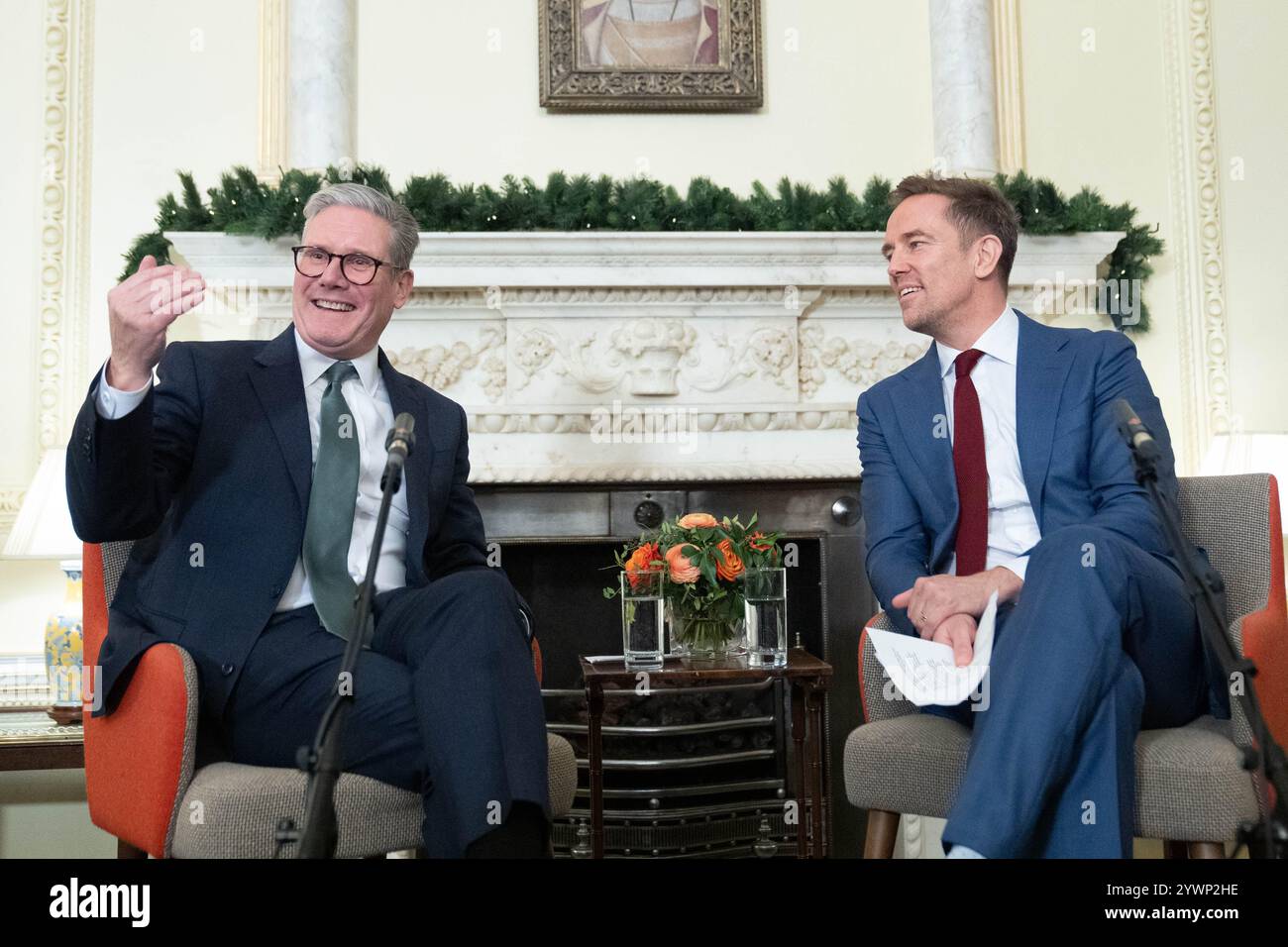 Prime Minister Sir Keir Starmer (left) speaking to tv presenter Simon ...