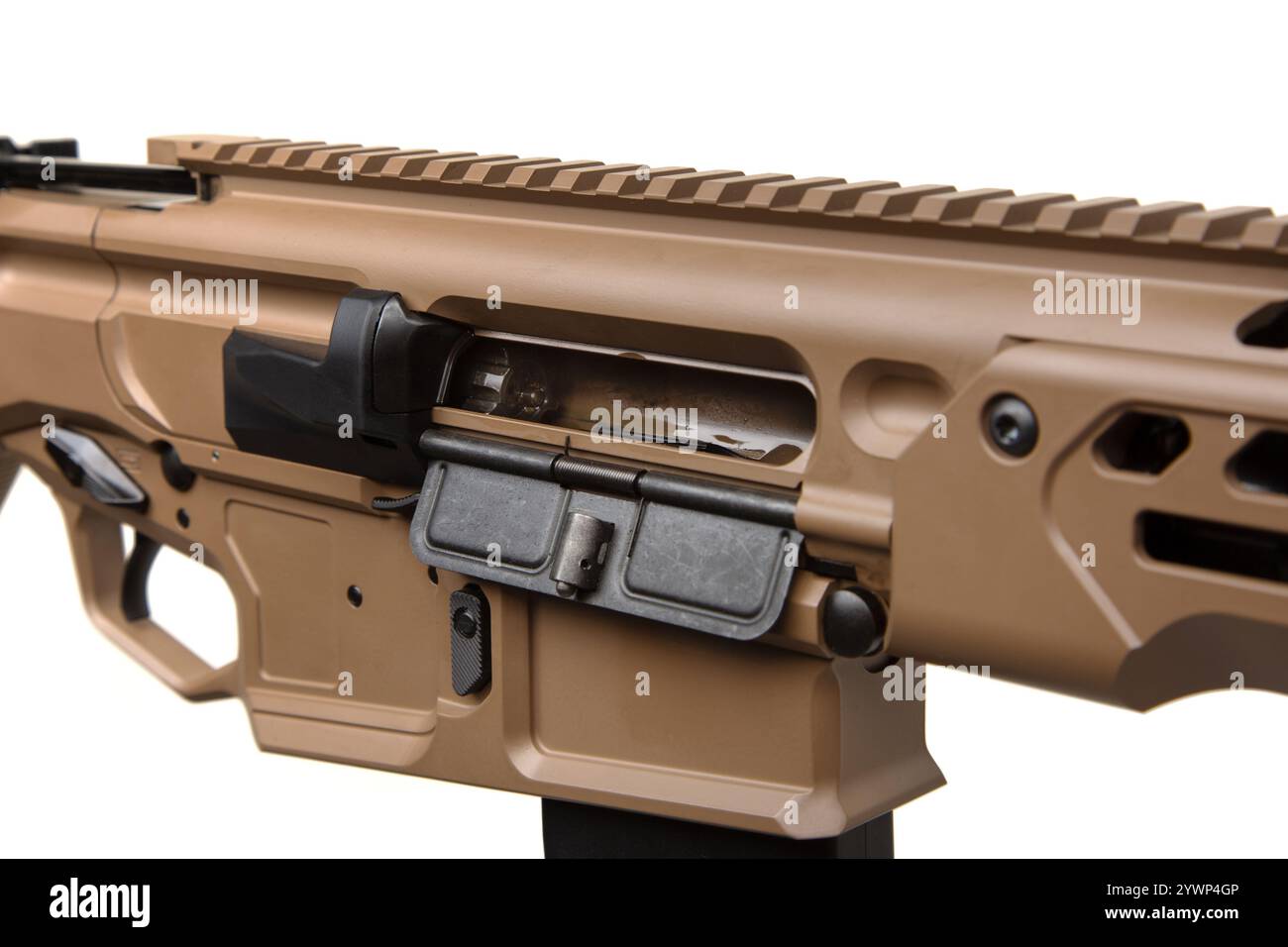 Modern tactical rifle with tan polymer stock, precision barrel, and ...