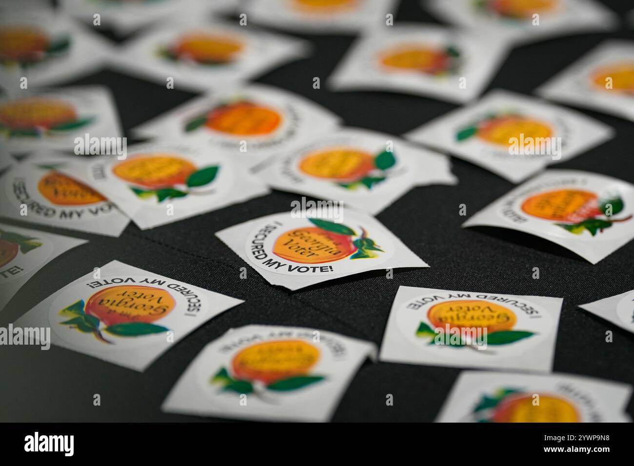 "I'm a Georgia Voter: I Secured My Vote" stickers are seen at the ...
