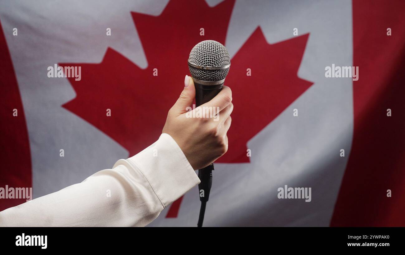 Woman singer tv presenter holding hi-res stock photography and images ...