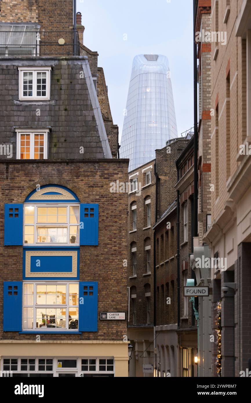 Carter Lane, London, shows the modern, glass-fronted, City of London ...