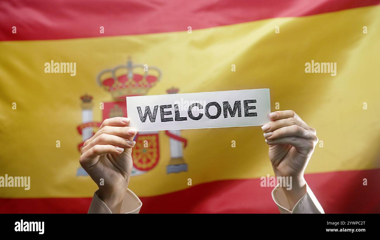 Woman With Welcome Lettering Title Text Cardboard On Spanish Flag ...
