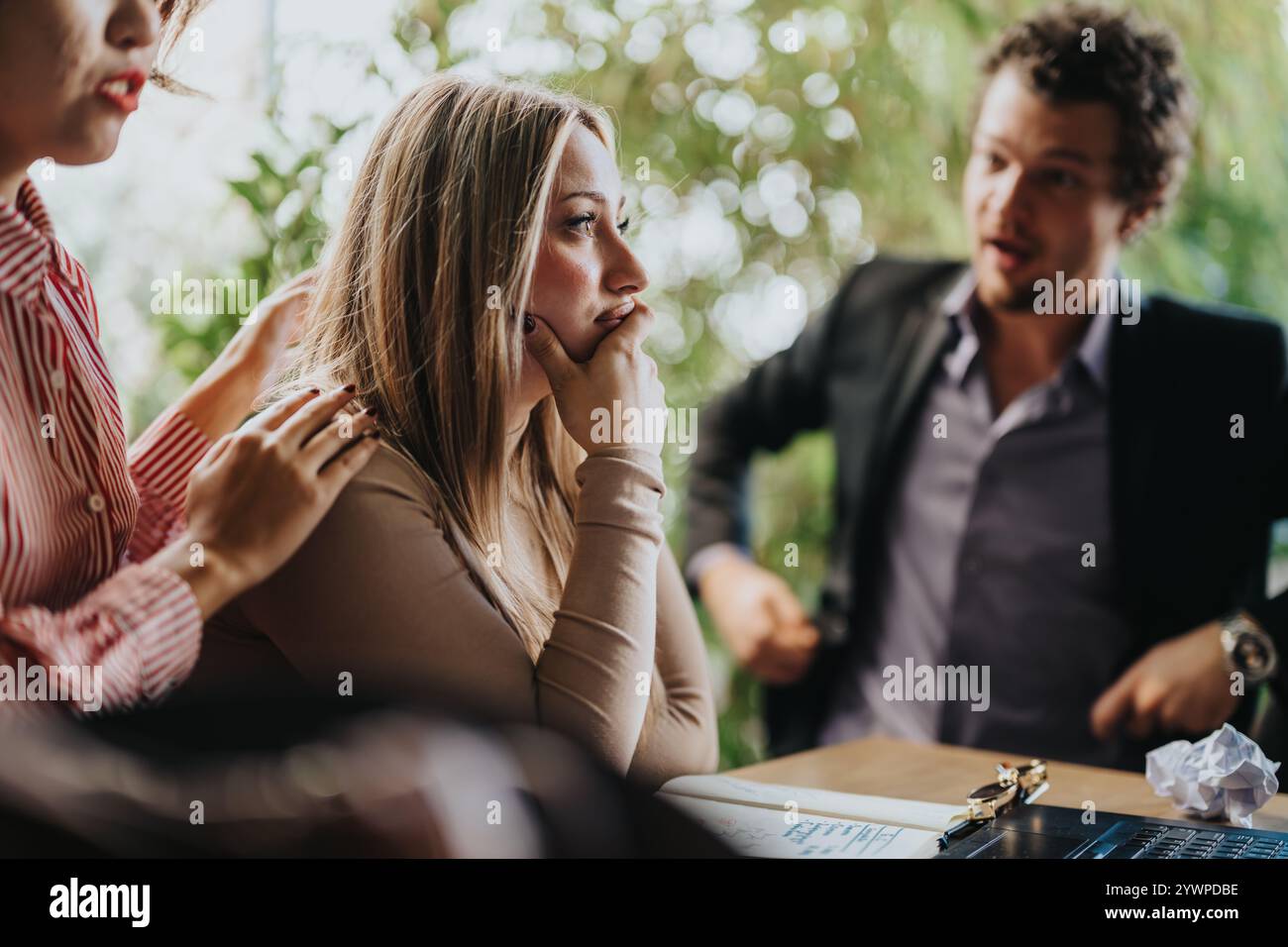 Worried business colleagues discussing work stress in office Stock ...