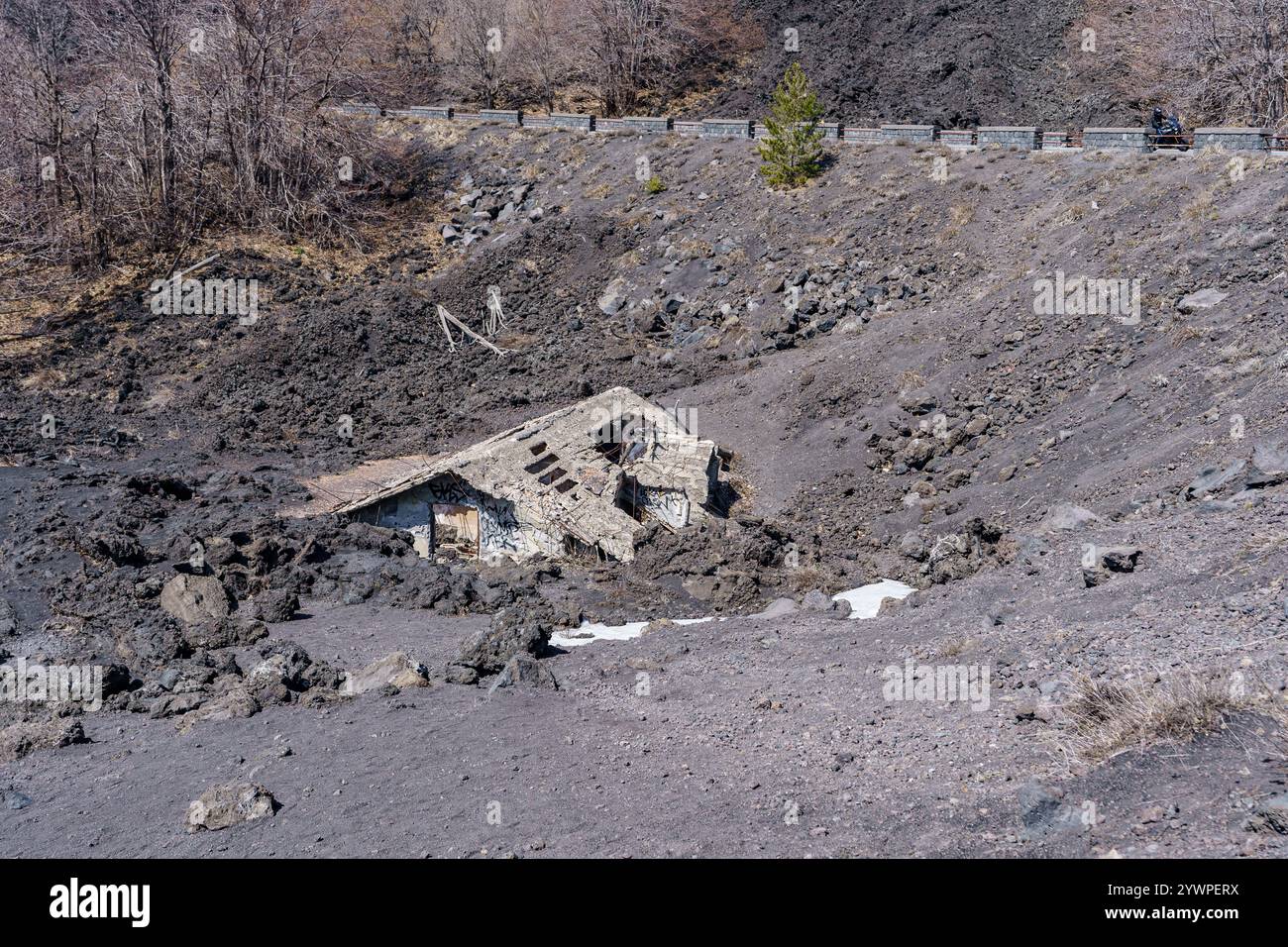 A house buried and destroyed by volcanic ash on the slopes of Mount ...