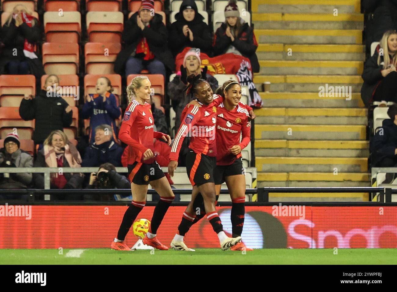 Gabby George of Manchester United celebrates her goal to make it 4-2 ...