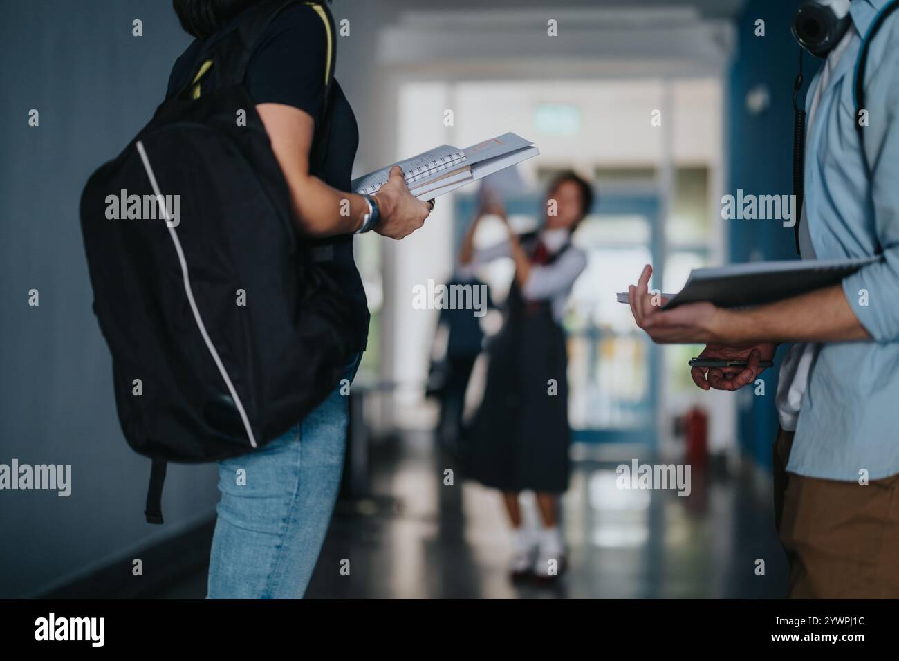 Pupils in school hallway hi-res stock photography and images - Alamy